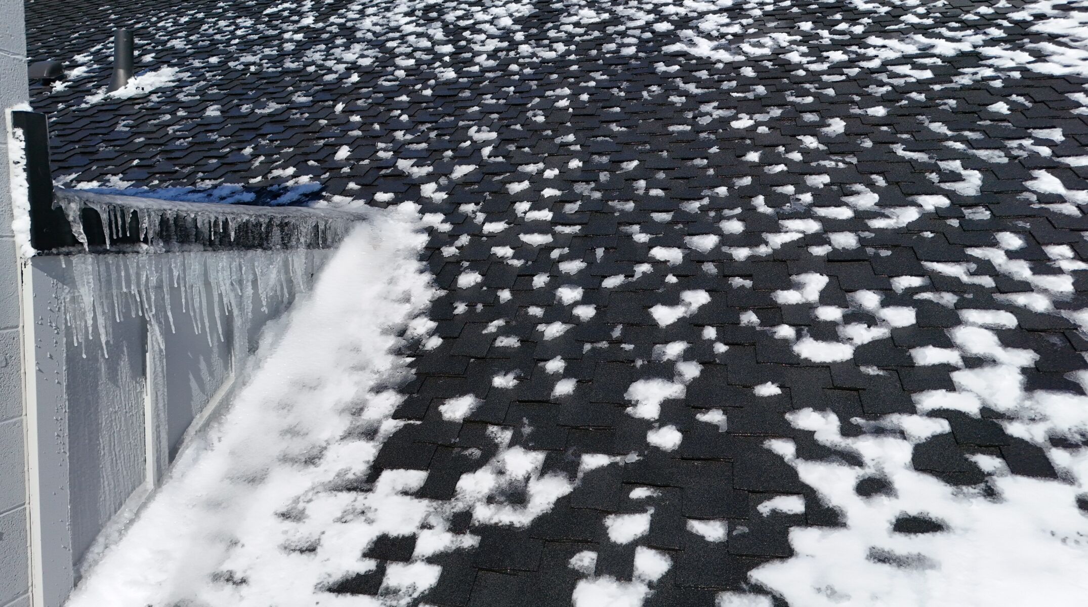Ice Dams on Roofs - Newman Roofing